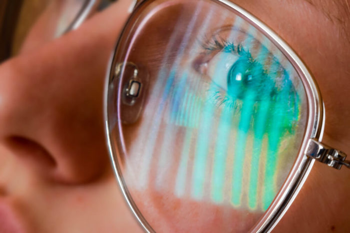 How To Reduce Eyeglass Glare on Zoom Calls - Art of Optiks
